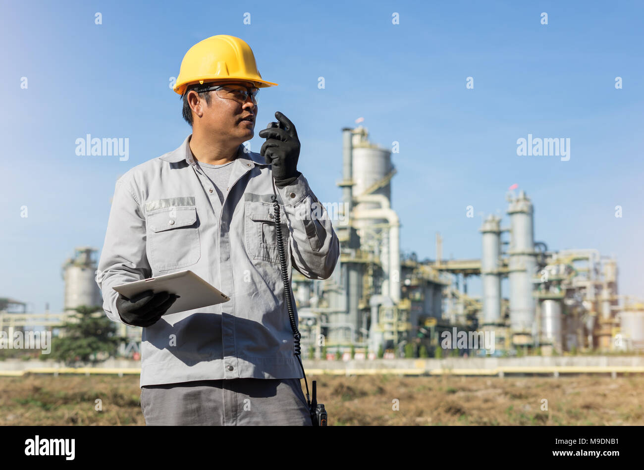 Engineering or technician working use radio transceivers check plan ...