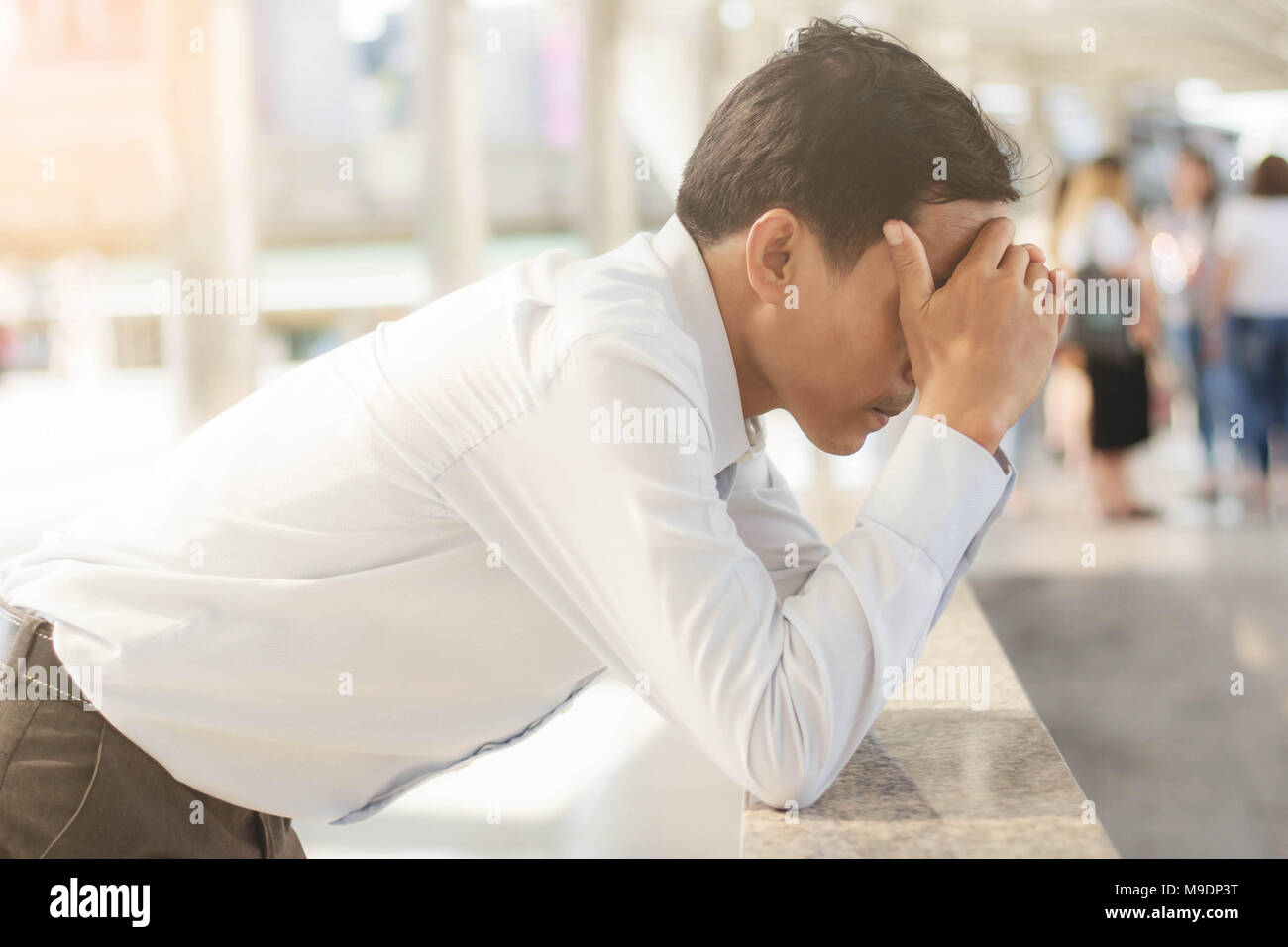 young man was tense because of stress from the work Stock Photo - Alamy