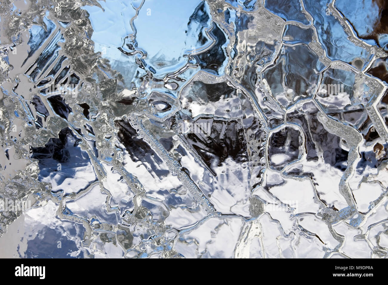abstract patterns in thin sheet of ice Stock Photo - Alamy