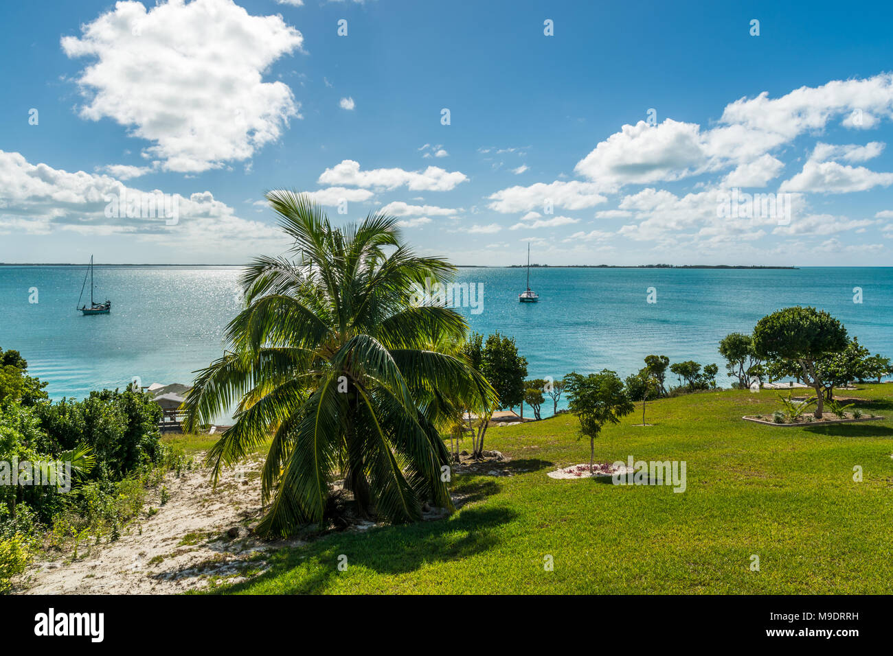 Bahamian Island View of Turquoise ocean showing sail boats on the water ...