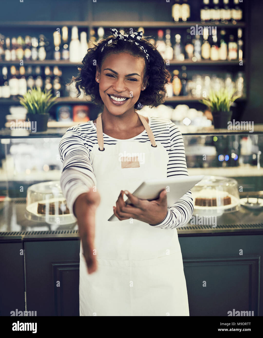 Hostess waitress employee hi-res stock photography and images - Alamy