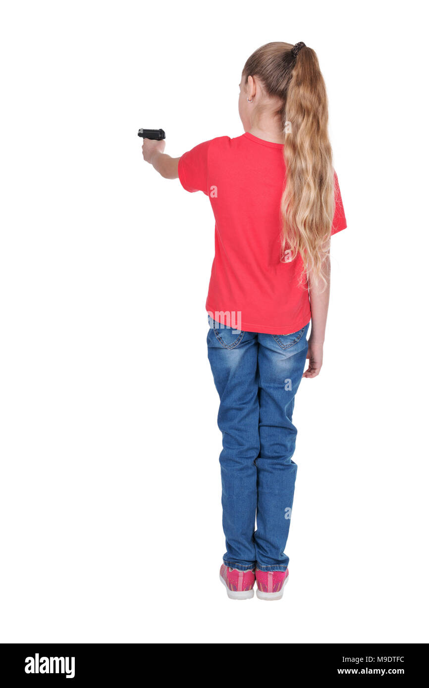 Girl aiming from the gun in the distance, rear view, isolated on white ...