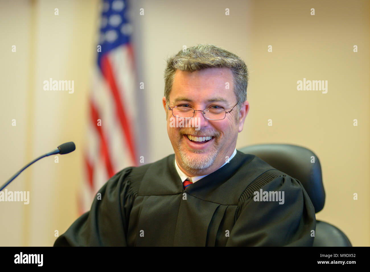 Laughing American Judge in Courtroom Stock Photo - Alamy