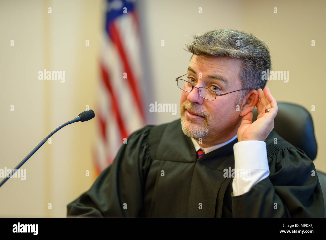 American Male Judge listening in Courtroom Stock Photo - Alamy