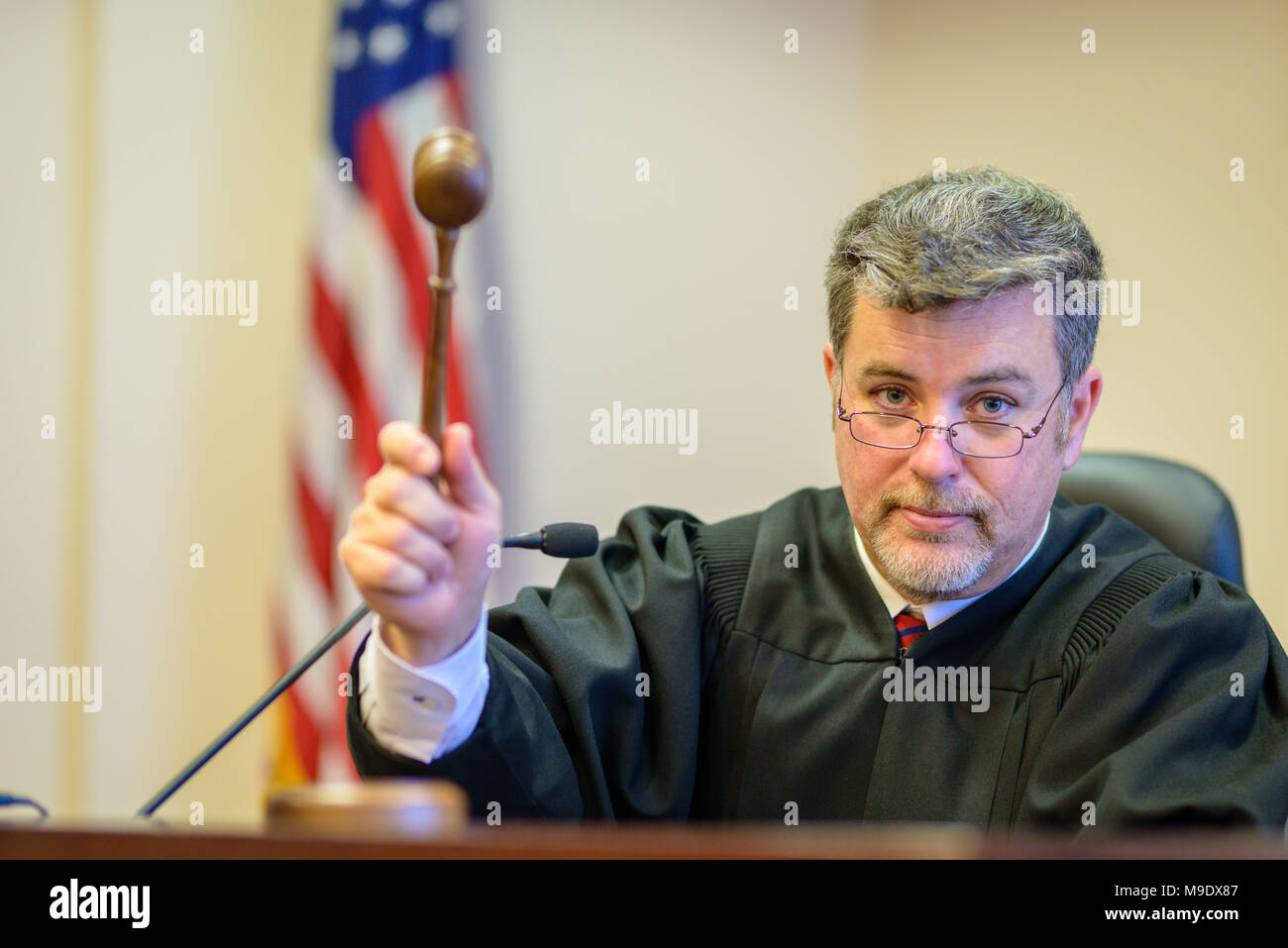 American Male Judge with Gavel and American Flag Stock Photo - Alamy