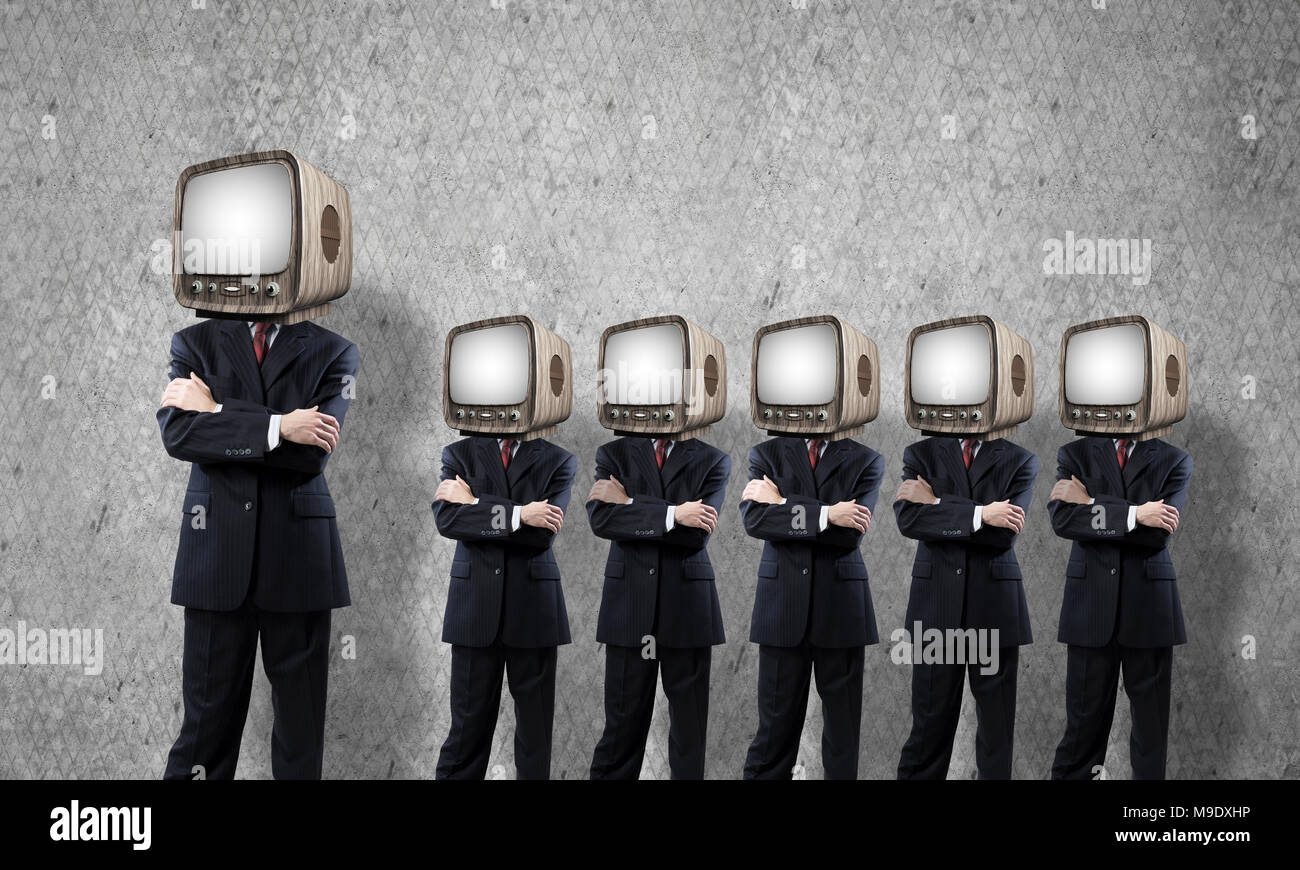 Businessmen in suits with old TV instead of their heads keeping arms ...