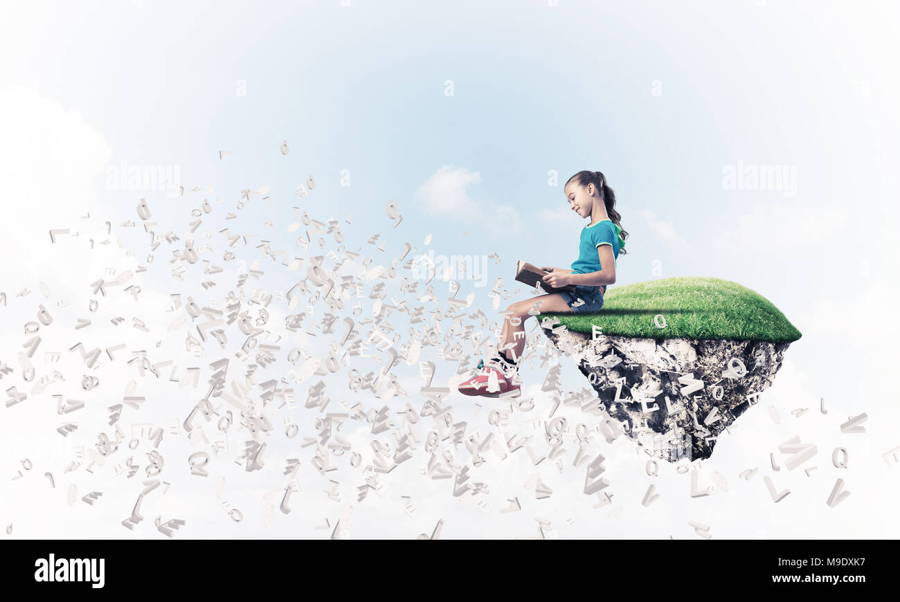 Cute smiling teenage girl on floating in sky island reading book Stock ...