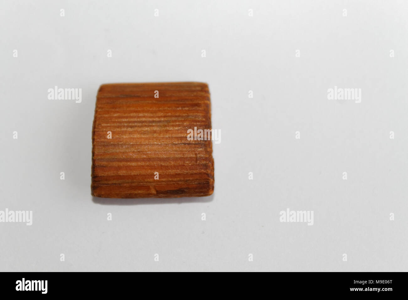 Wooden plain rune lie on a table on a white background Stock Photo - Alamy
