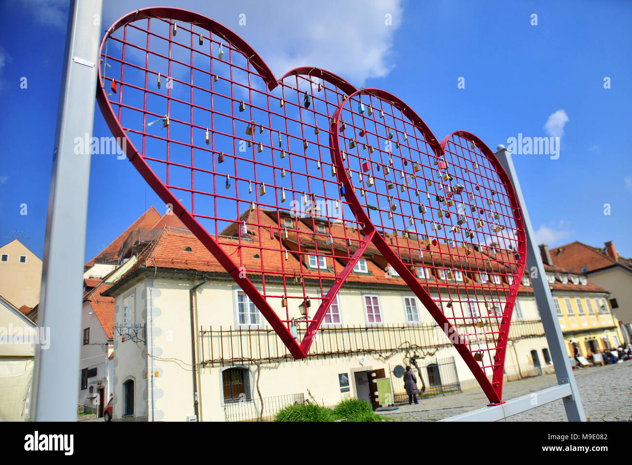 Love sculpture in a shape of a heart with locks Stock Photo - Alamy