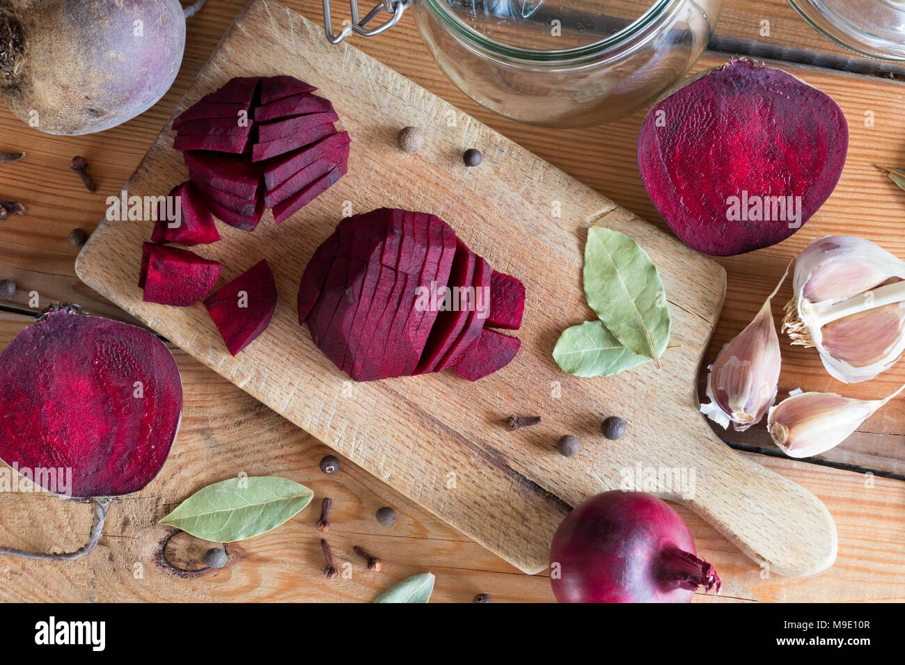 Sliced red beets on a cutting board - preparation of fermented beets ...
