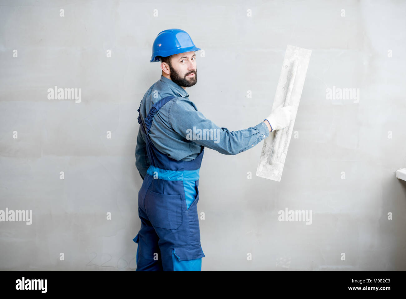 Man plasterer hi-res stock photography and images - Alamy