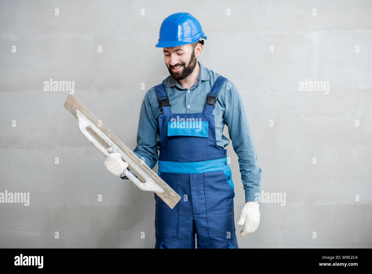 Man plasterer hi-res stock photography and images - Alamy