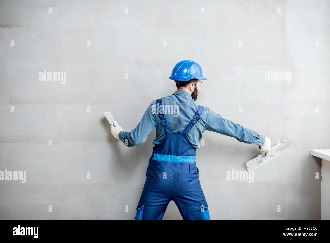 Man plasterer hi-res stock photography and images - Alamy
