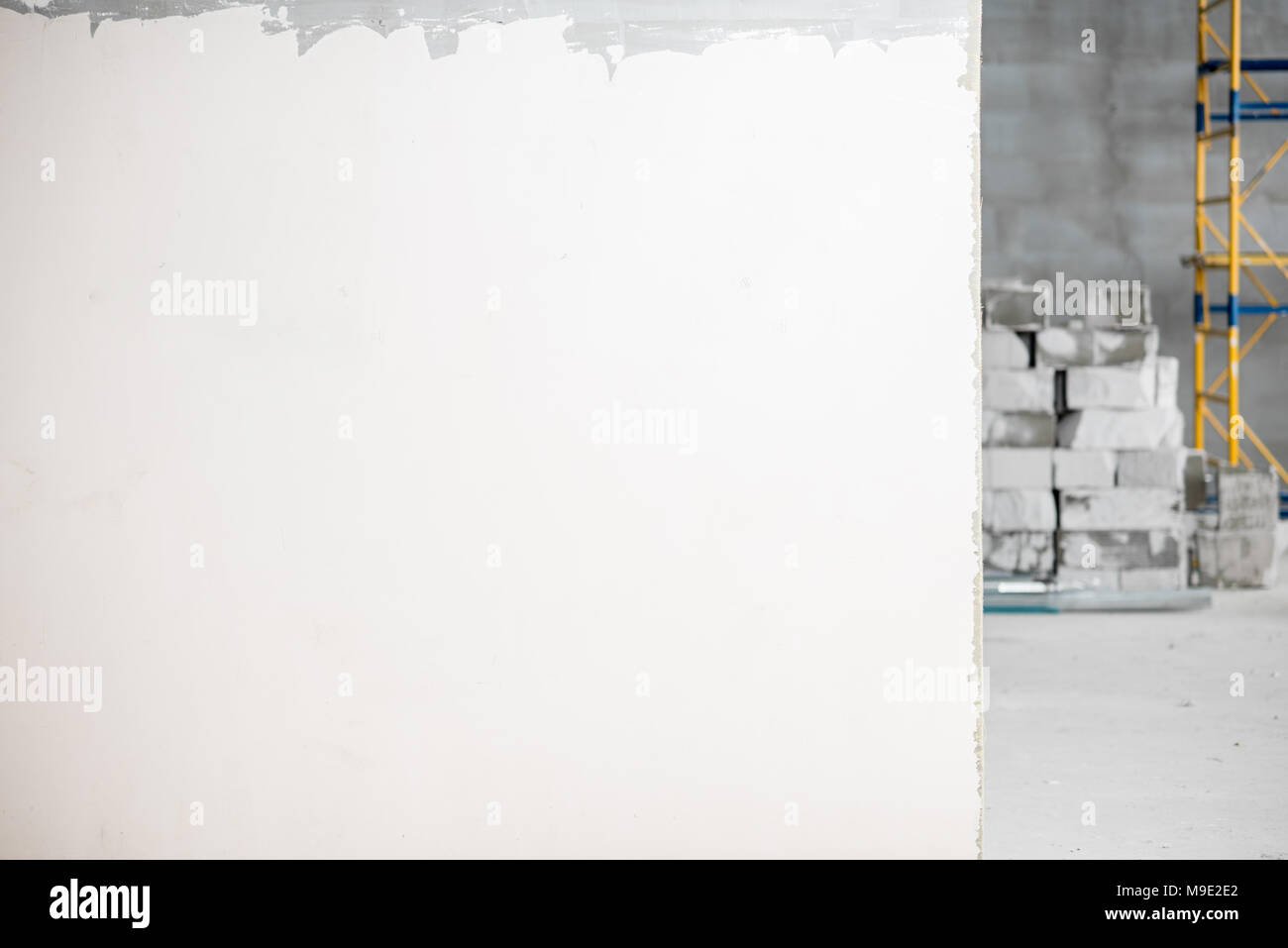 Wall at the construction site Stock Photo - Alamy