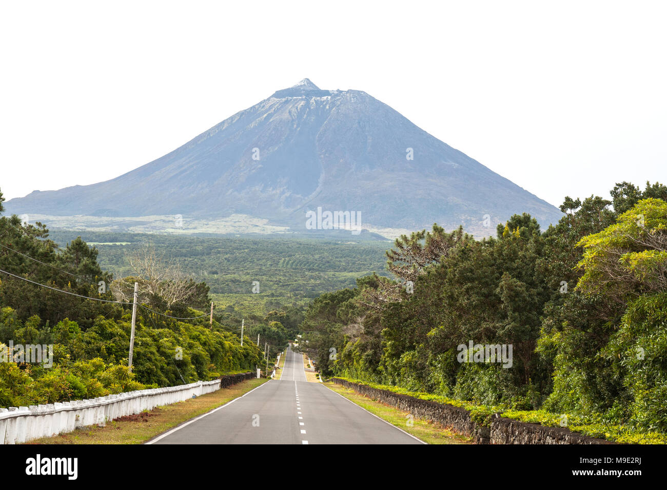 Direct asphalt road against the background of the volcano Pico, Pico ...