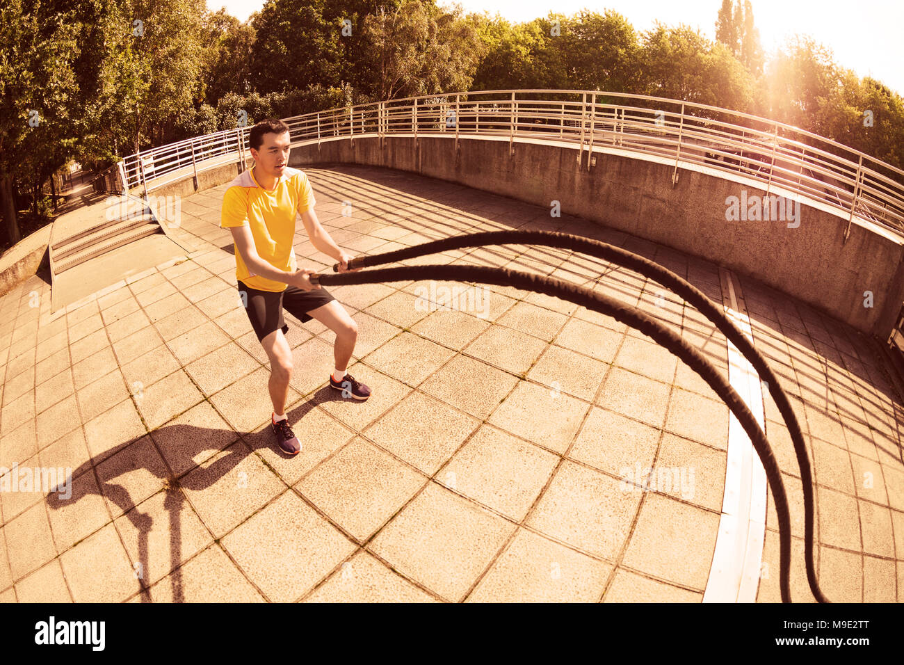 Strong man exercising hi-res stock photography and images - Alamy