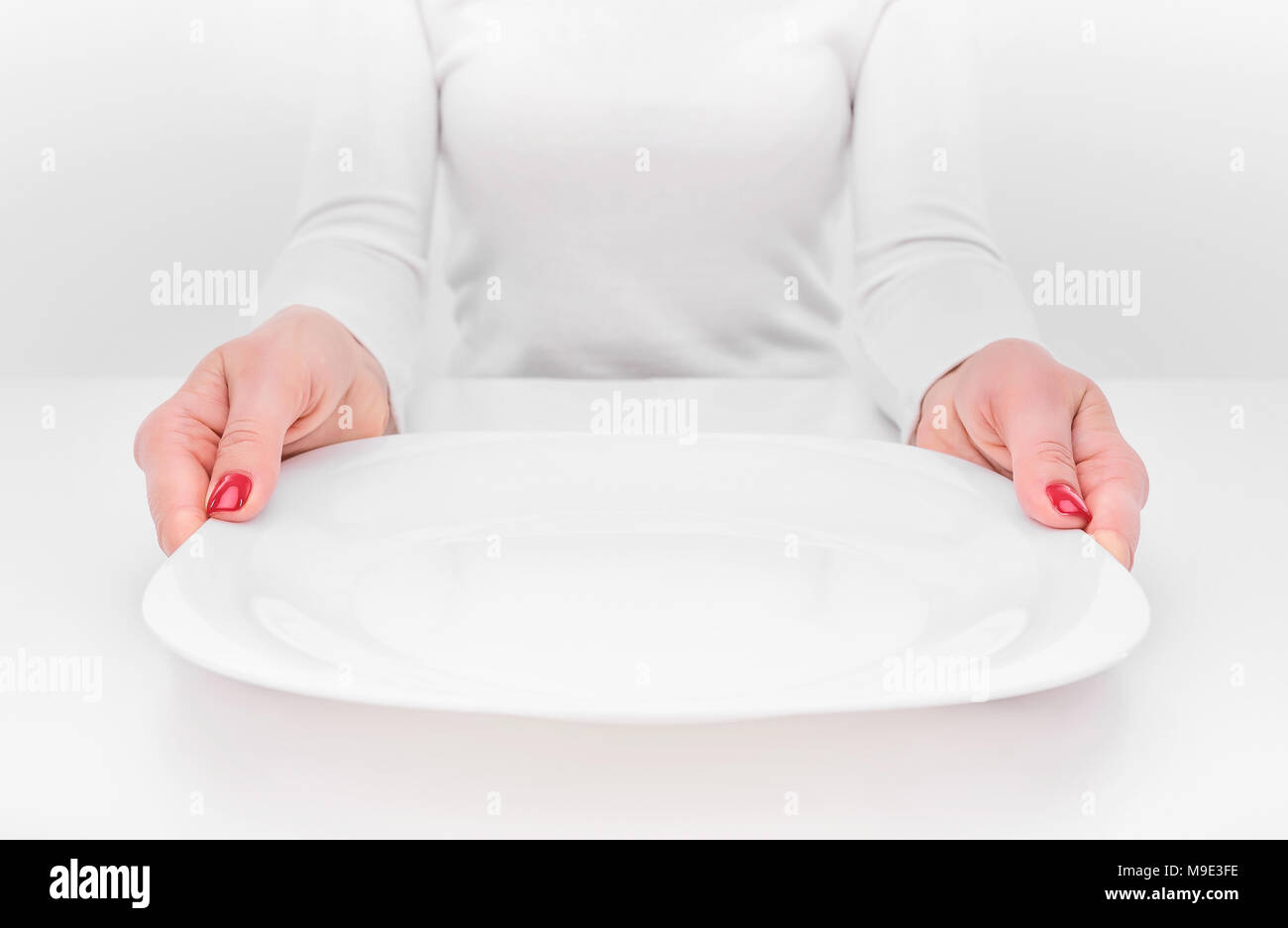 Empty plate hunger hi-res stock photography and images - Alamy