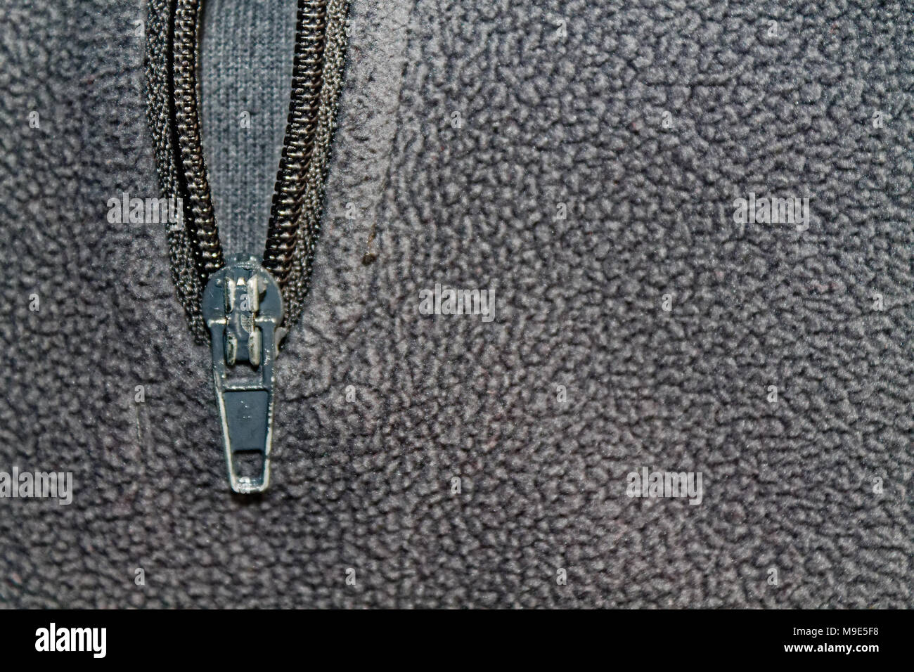 Zipper clothing gray jacket macro background Stock Photo - Alamy