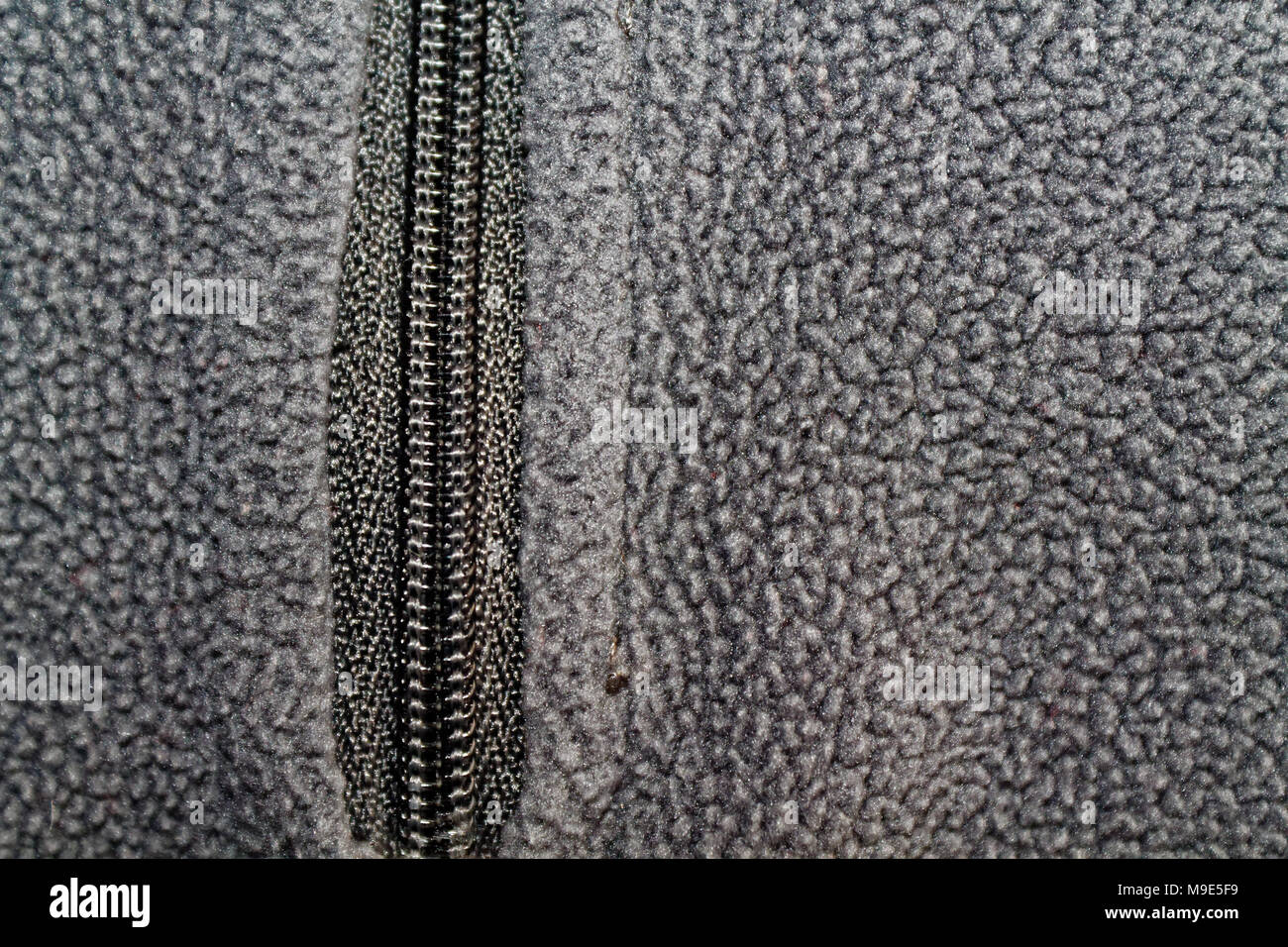 Zipper clothing gray jacket macro background Stock Photo - Alamy