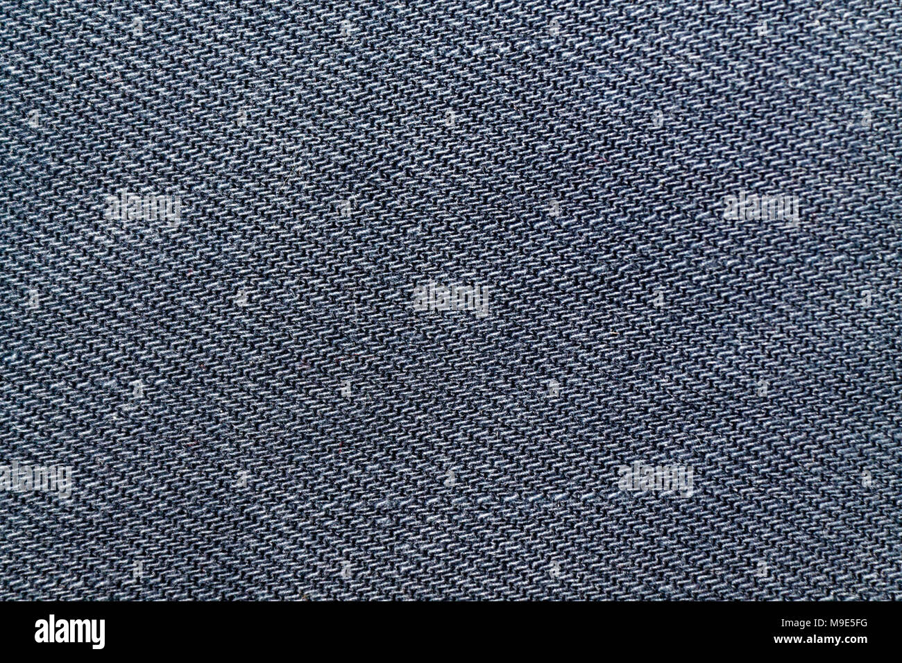 Blue denim macro texture with seam for jeans background Stock Photo - Alamy