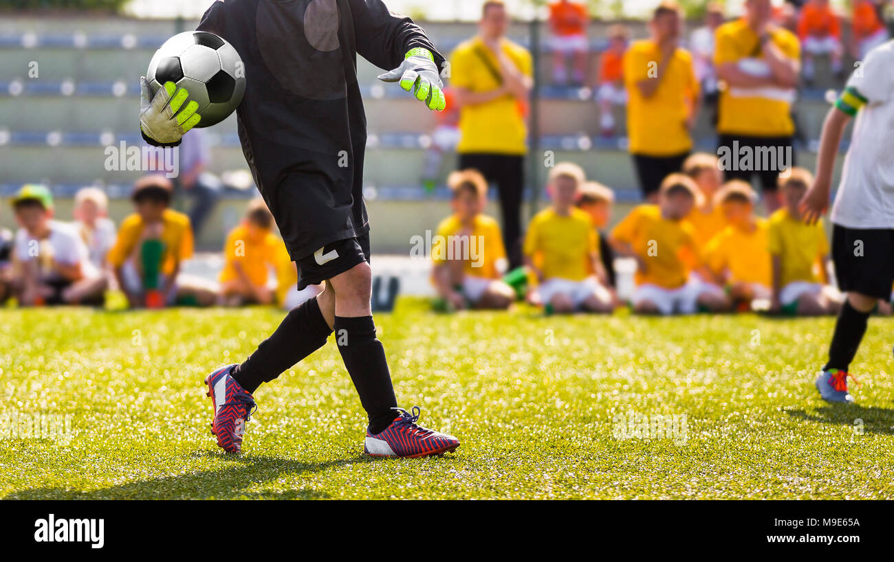 Soccer Goalkeeper Throw. Football Training Game for Kids. Young Boy as ...