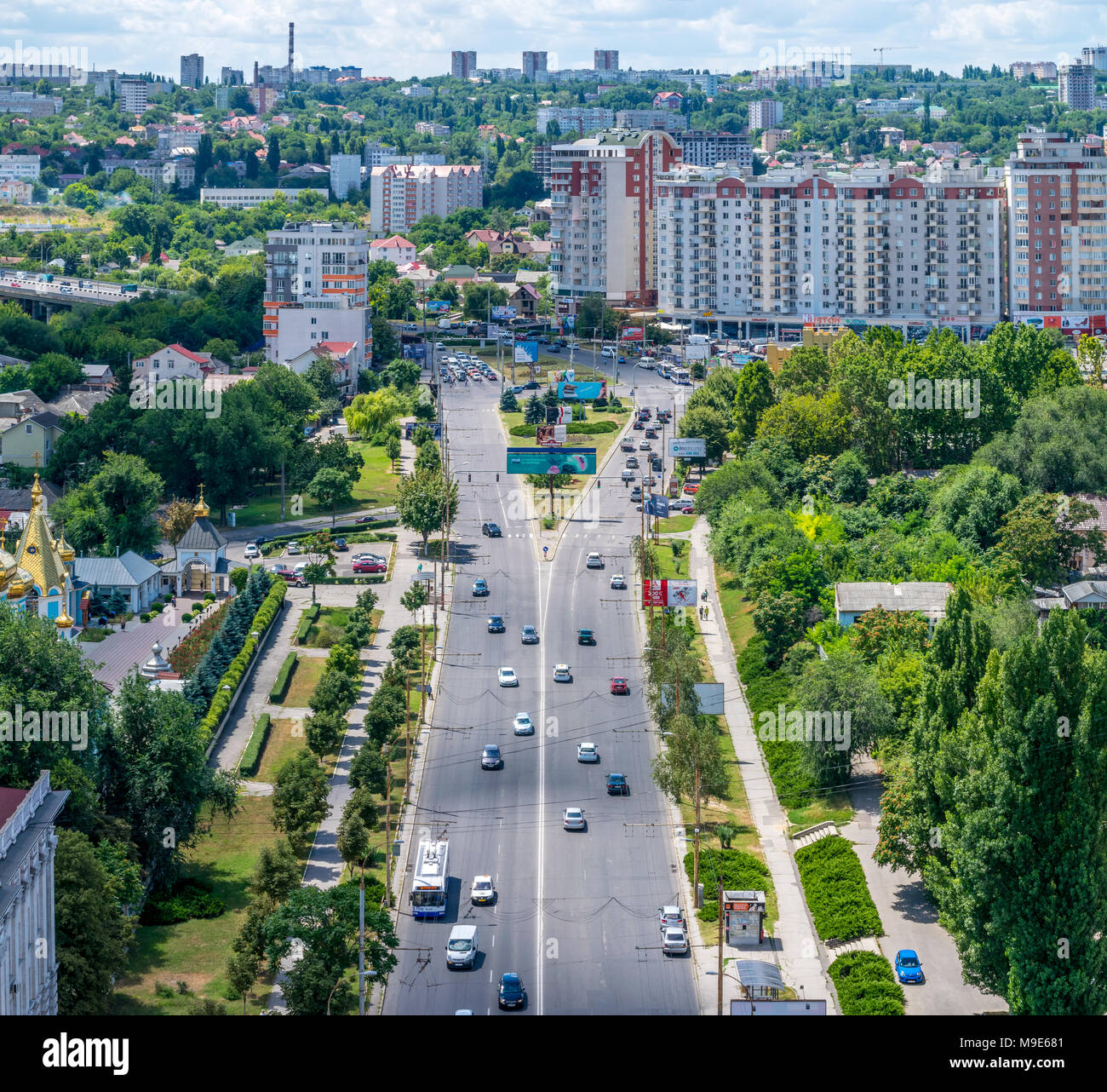 CHISINAU, MOLDOVA - 21 JULY, 2016: Traffic artery of a green city ...