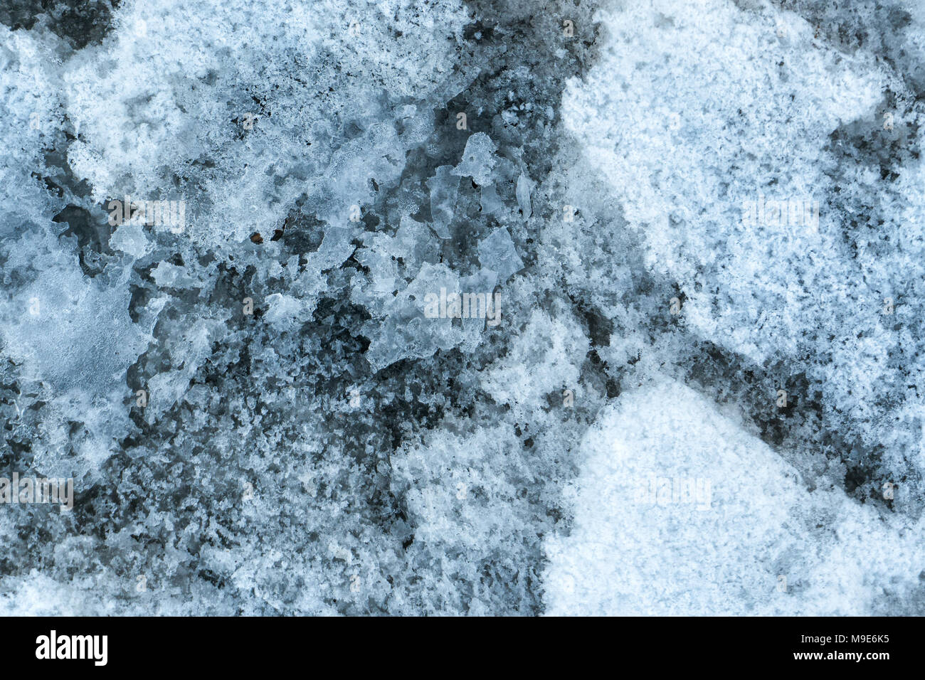 texture of ice crust in winter on the lake Stock Photo - Alamy