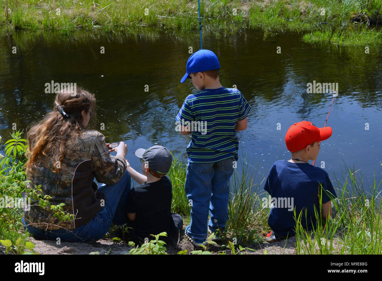 Kids Fishing Day Stock Photo - Alamy