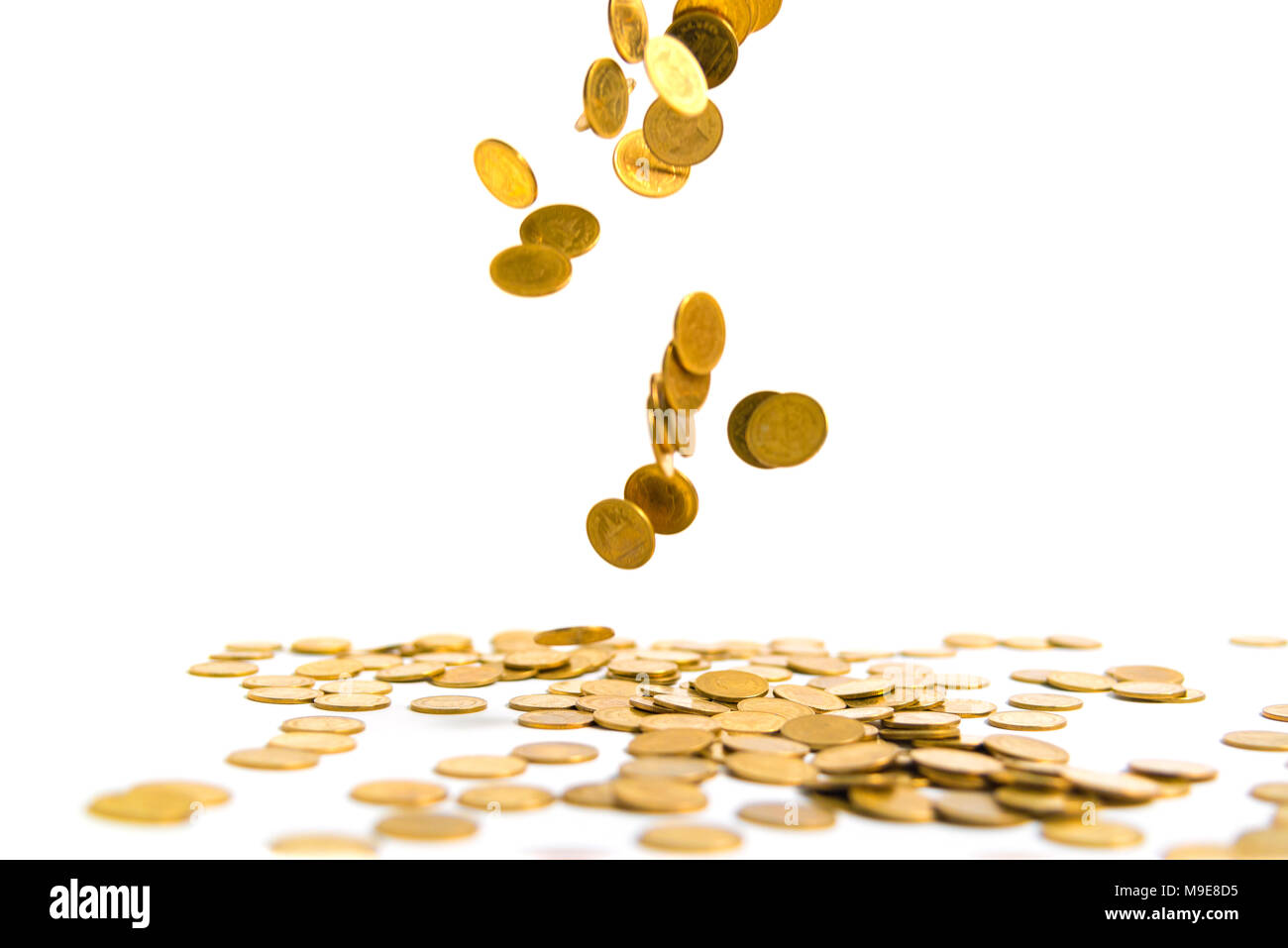 Falling gold coins money isolated on the white background, business ...