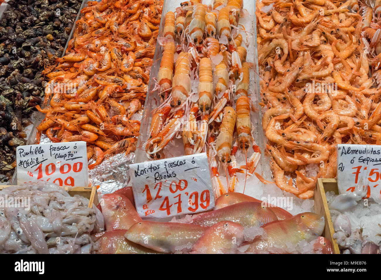 Shrimps, fish and seafood for sale at a market in Madrid, Spain Stock ...