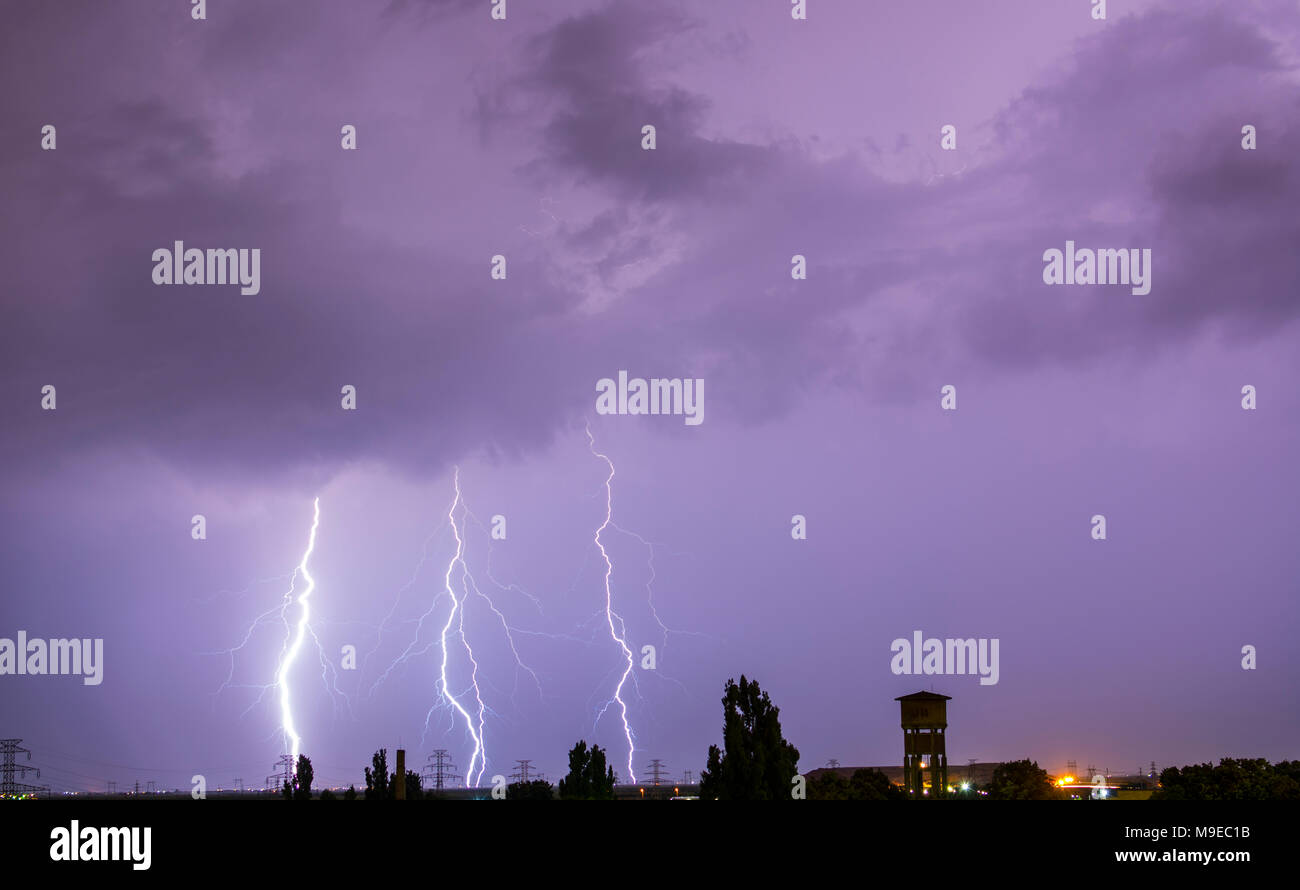 Lightning flash over a city, Thunderstorm , electricity blast storm ...