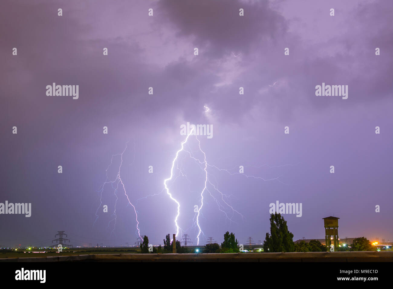 Lightning flash over a city, Thunderstorm , electricity blast storm ...
