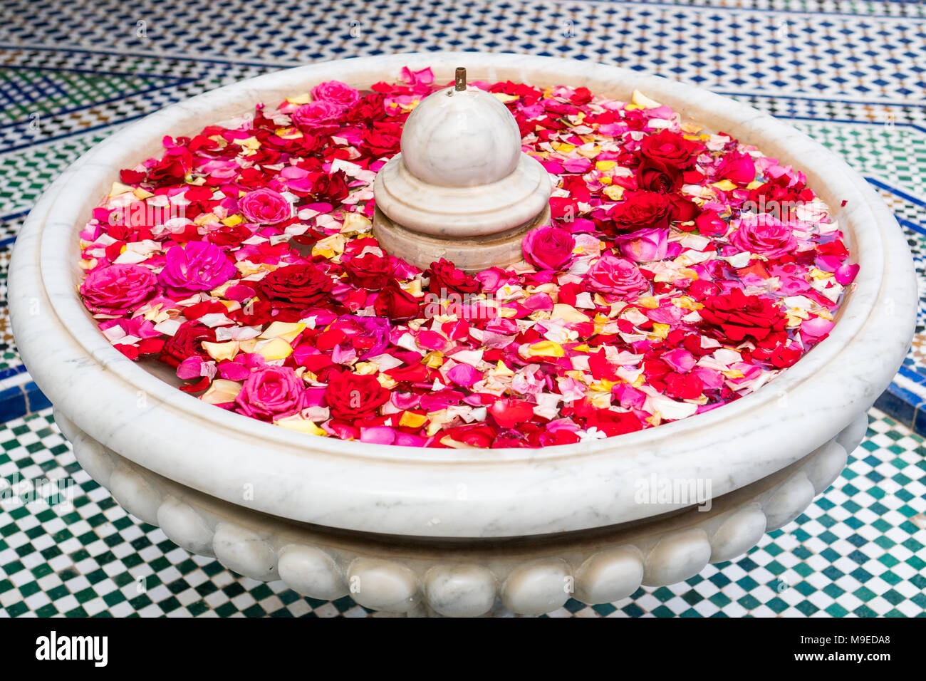 Romantic floral decoration with red and pink roses floating in a ...