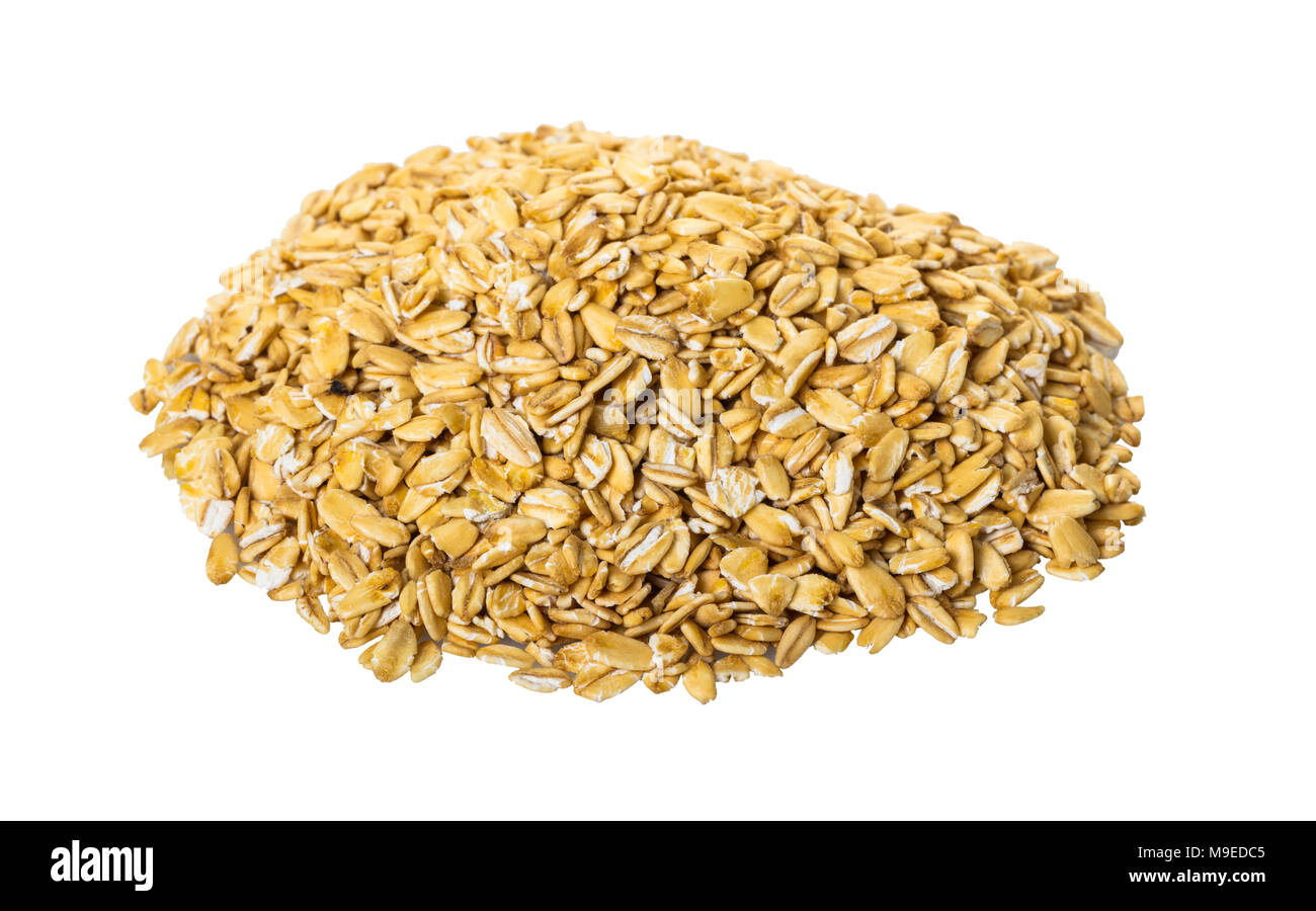 raw oatmeal closeup on white isolated background Stock Photo - Alamy