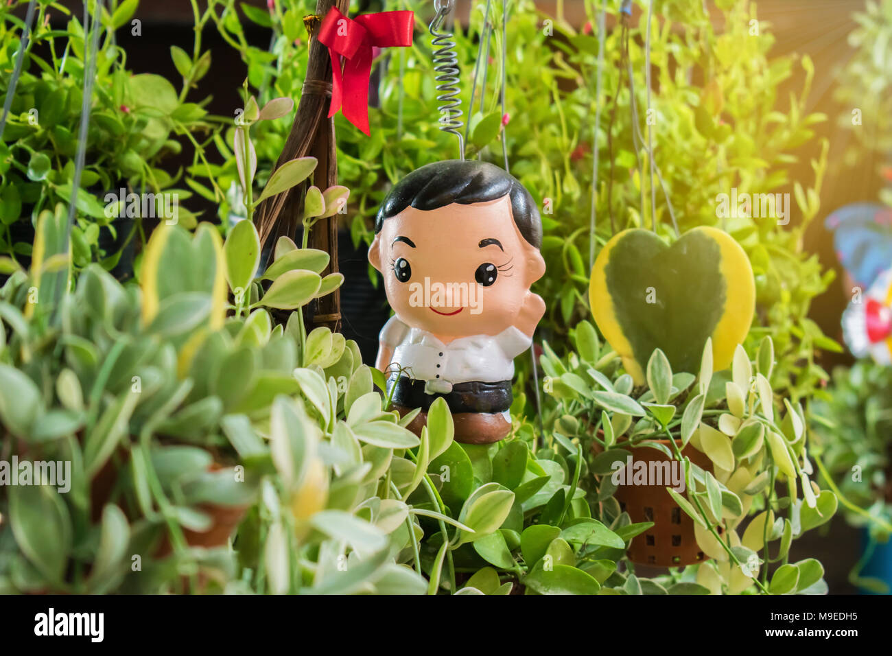 Hanging Tree and Ceramic Doll Stock Photo - Alamy