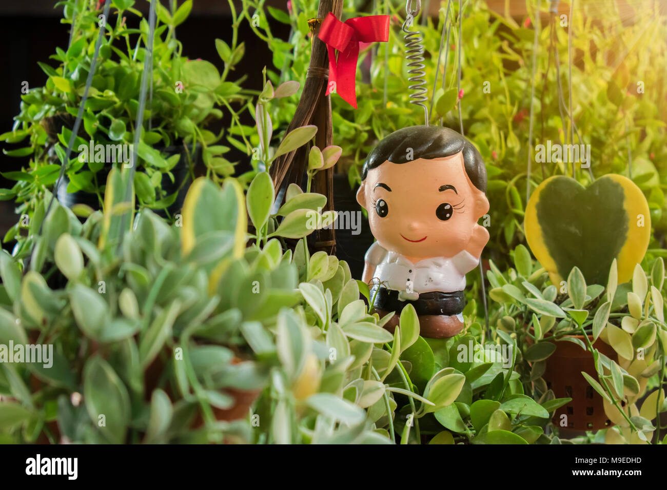 Hanging Tree with Ceramic Doll Stock Photo - Alamy