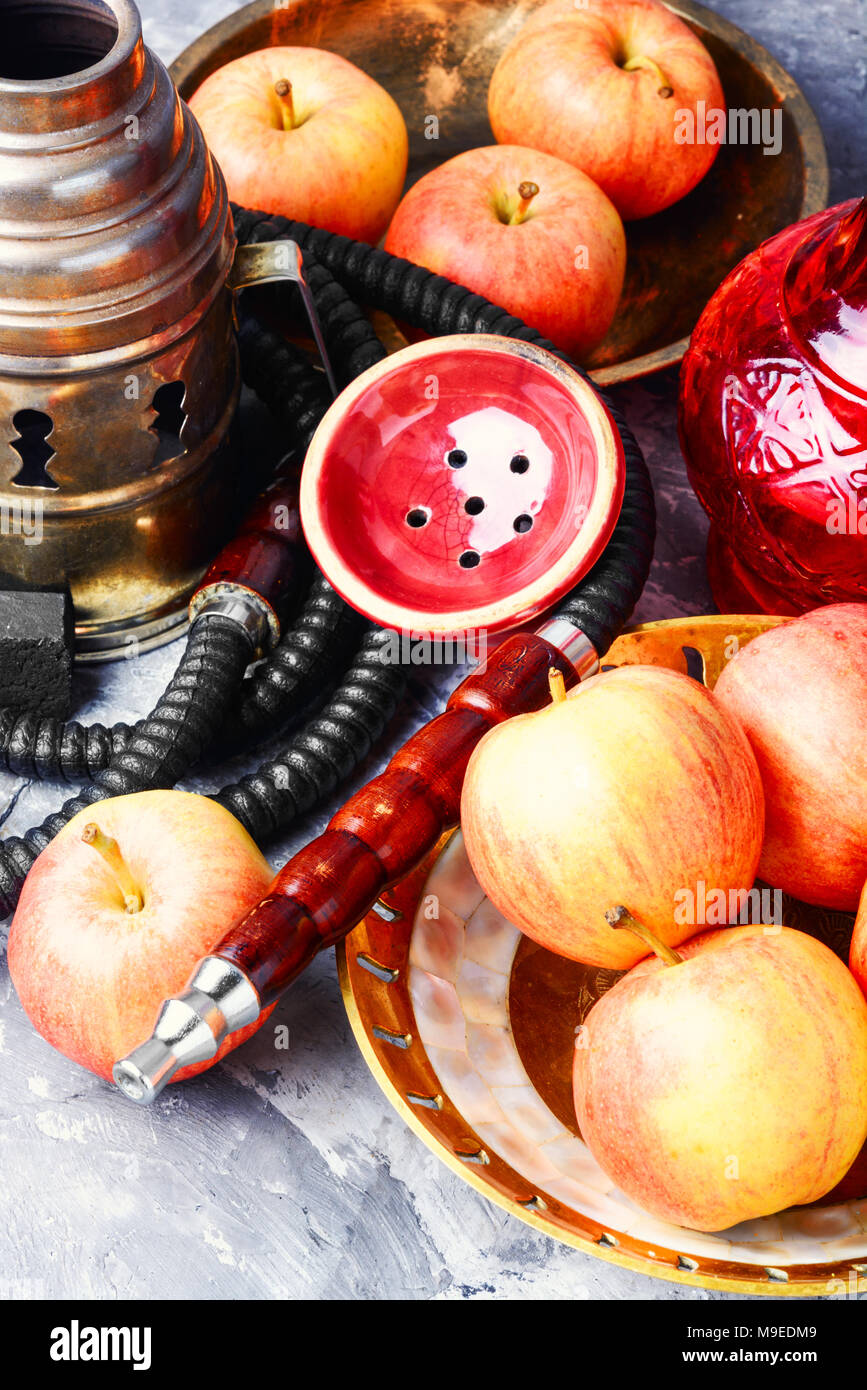 Smoke hookah with apple.Shisha concept.Hookah concept.Fruit hookah ...