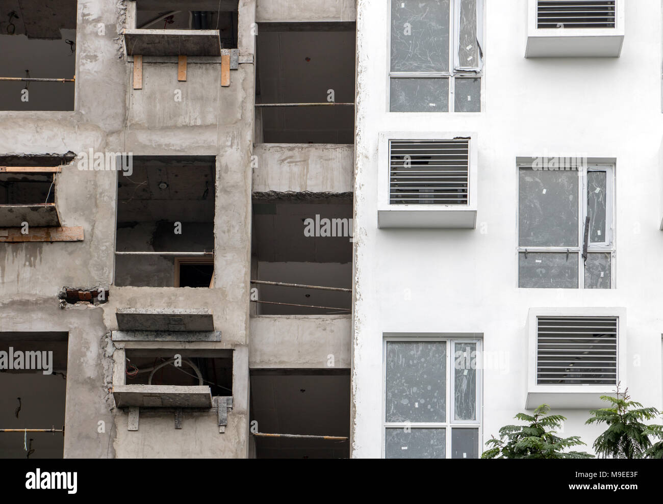 Reconstruction of residential building. Half of the apartment house is ...