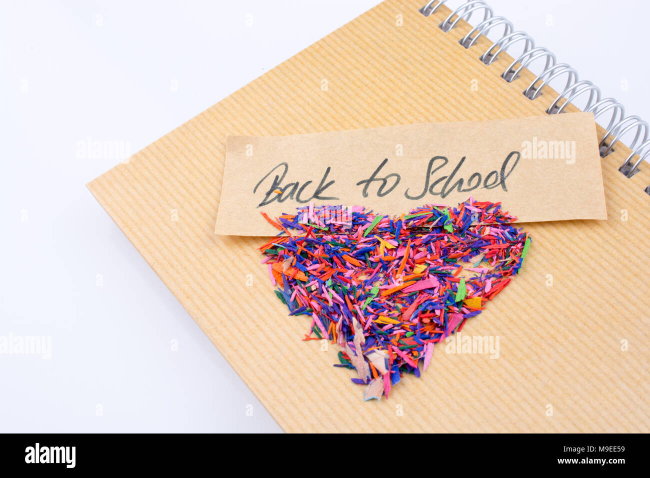 Back to school written title and a heart shape on a notebook Stock ...