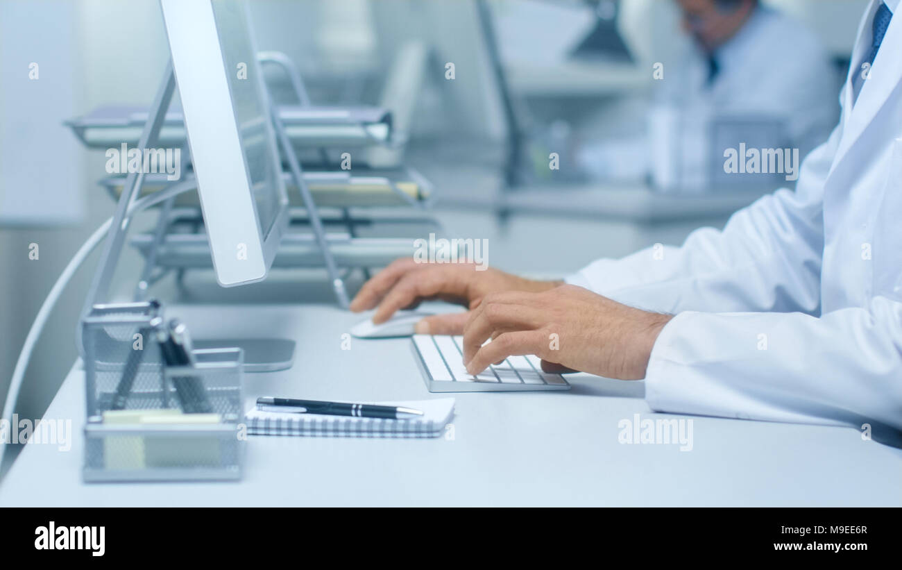 Close up medical assistant typing hi-res stock photography and images ...