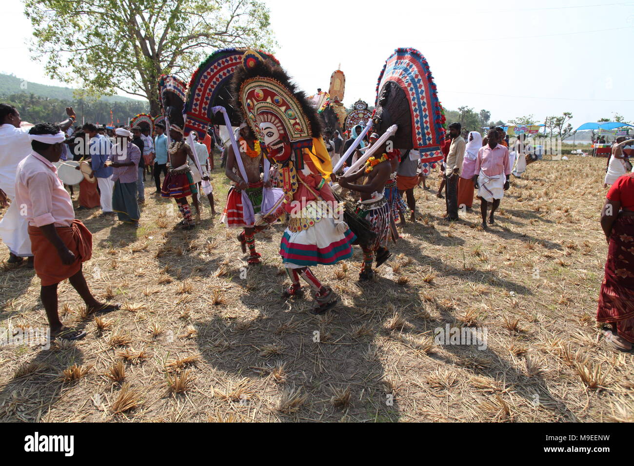 procession of puthan and thira,or lord siva and goddess kaali,in ...