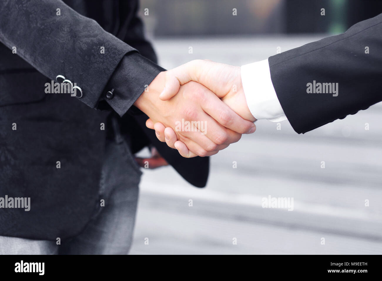 close up. handshake business partners on blurred background Stock Photo ...