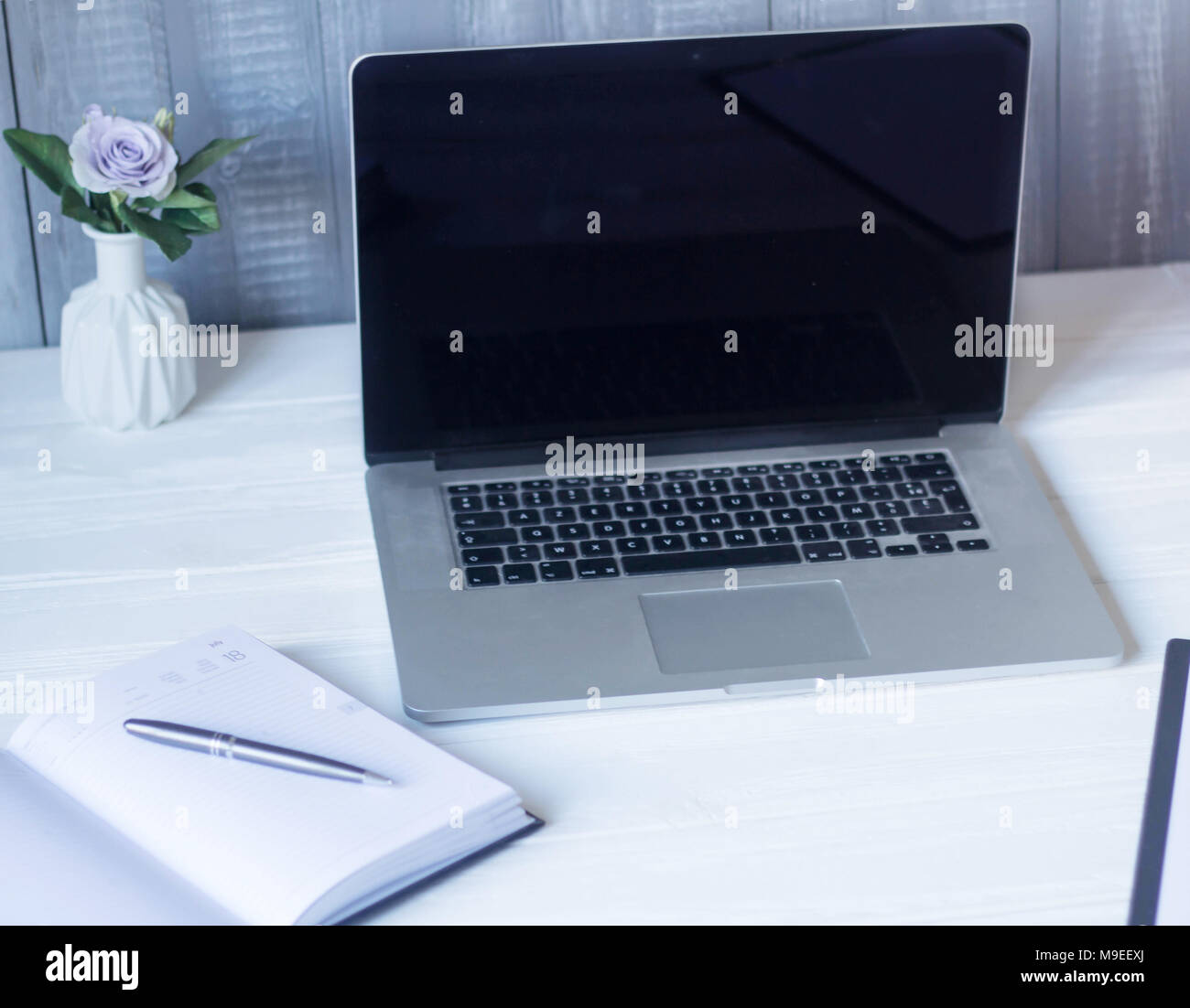 laptop and documents in the workplace Stock Photo - Alamy