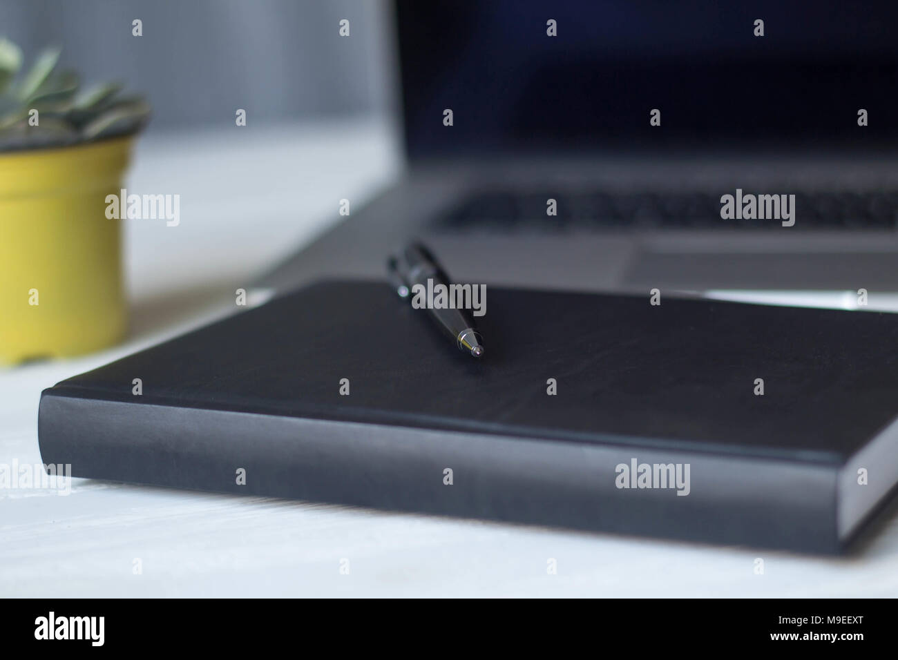 laptop and documents in the workplace Stock Photo - Alamy