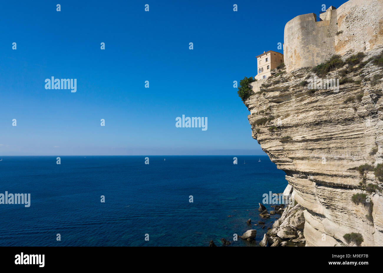 Citadel of Bonifacio, built on chalkstone cliff, Strait of Bonifacio ...