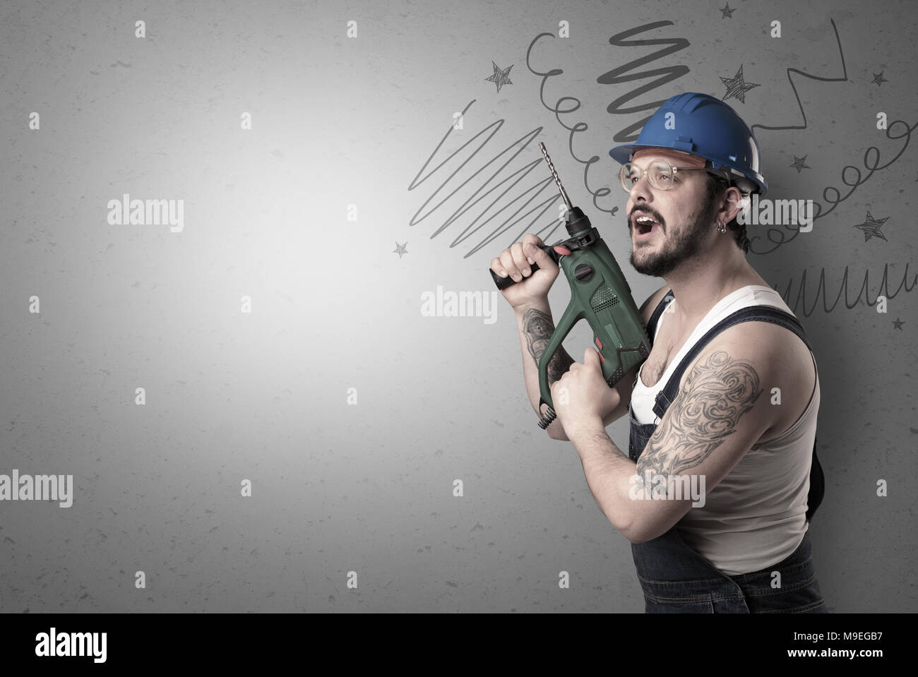 Handyman with tool in his hand and hand drawn lines above Stock Photo ...