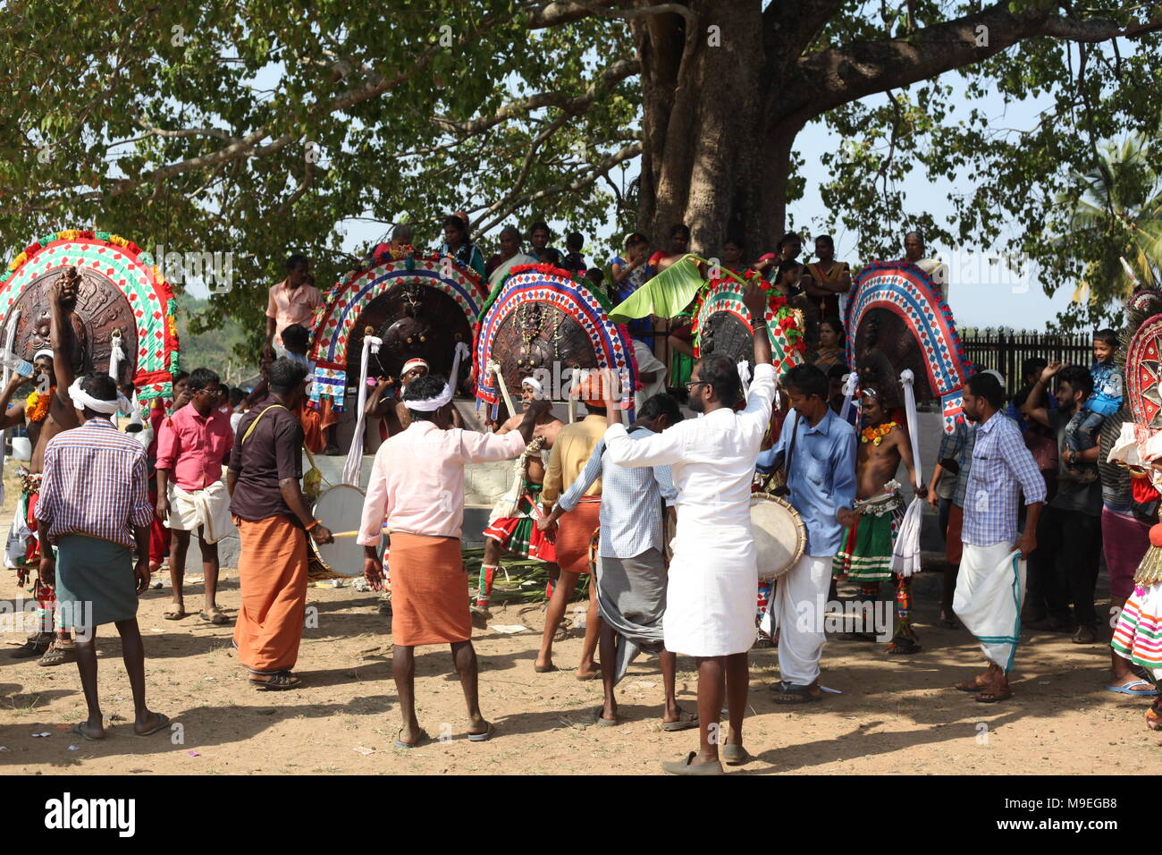 temple festival in kerala,with procession of kuthiravela or motif ...