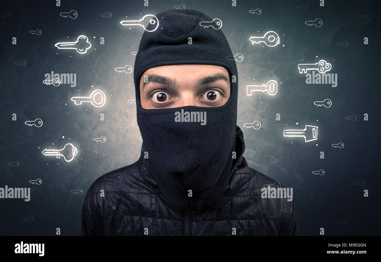 Burglar standing with tools in his hand Stock Photo - Alamy