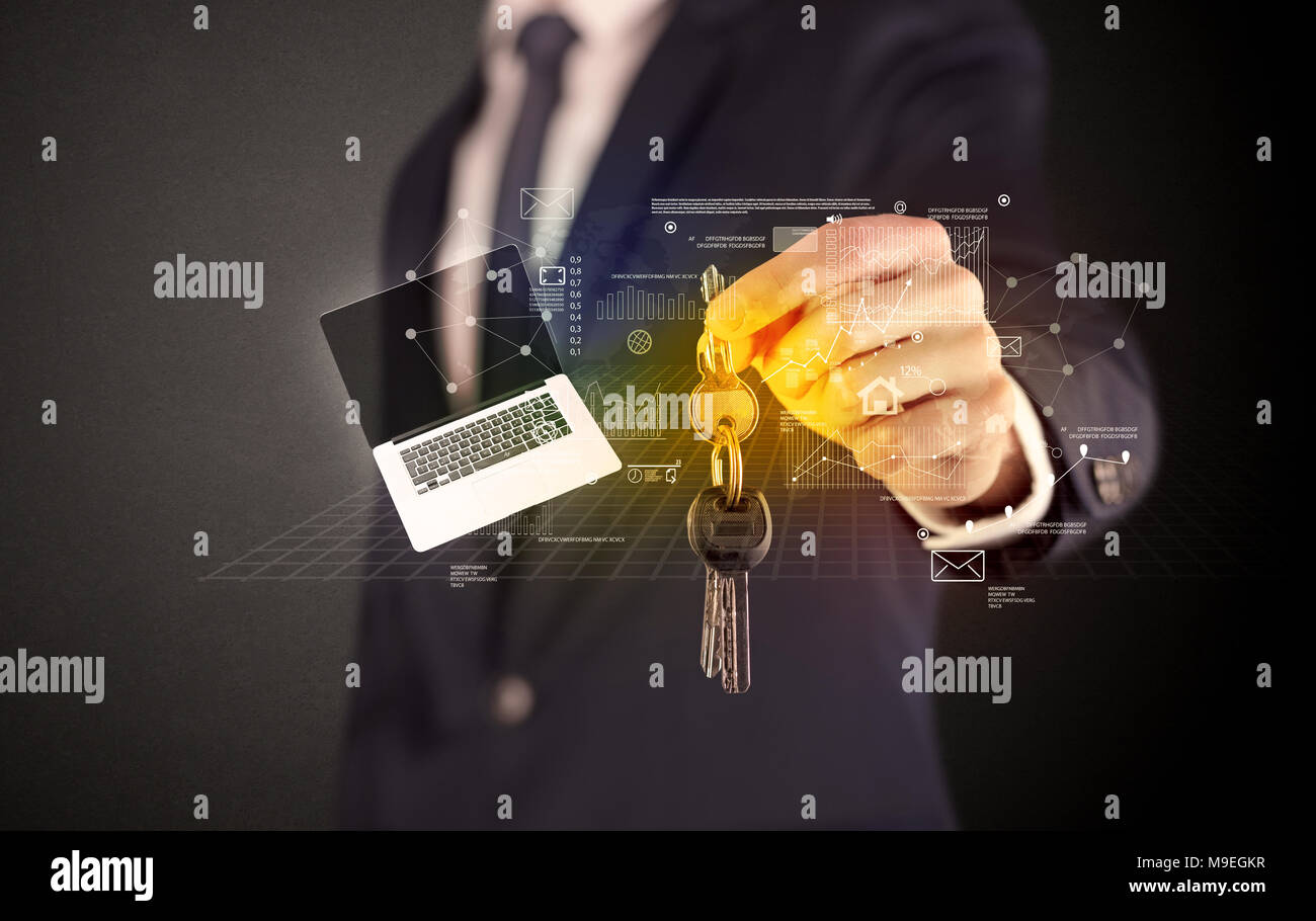 Businessman in suit holding keys with statistics, graphs and icons ...