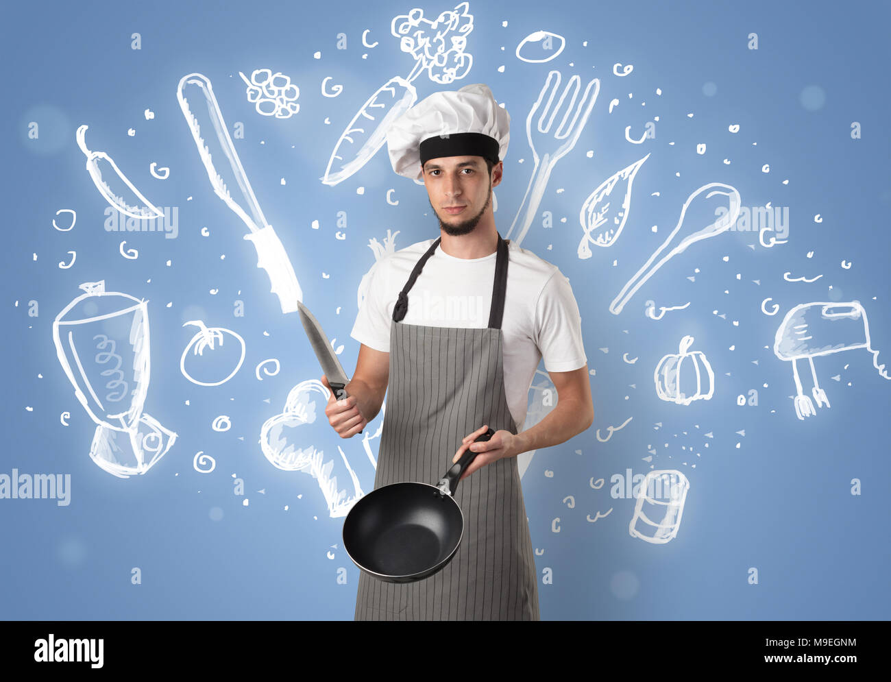 Young cook with kitchen instruments and drawn recipe concept on ...